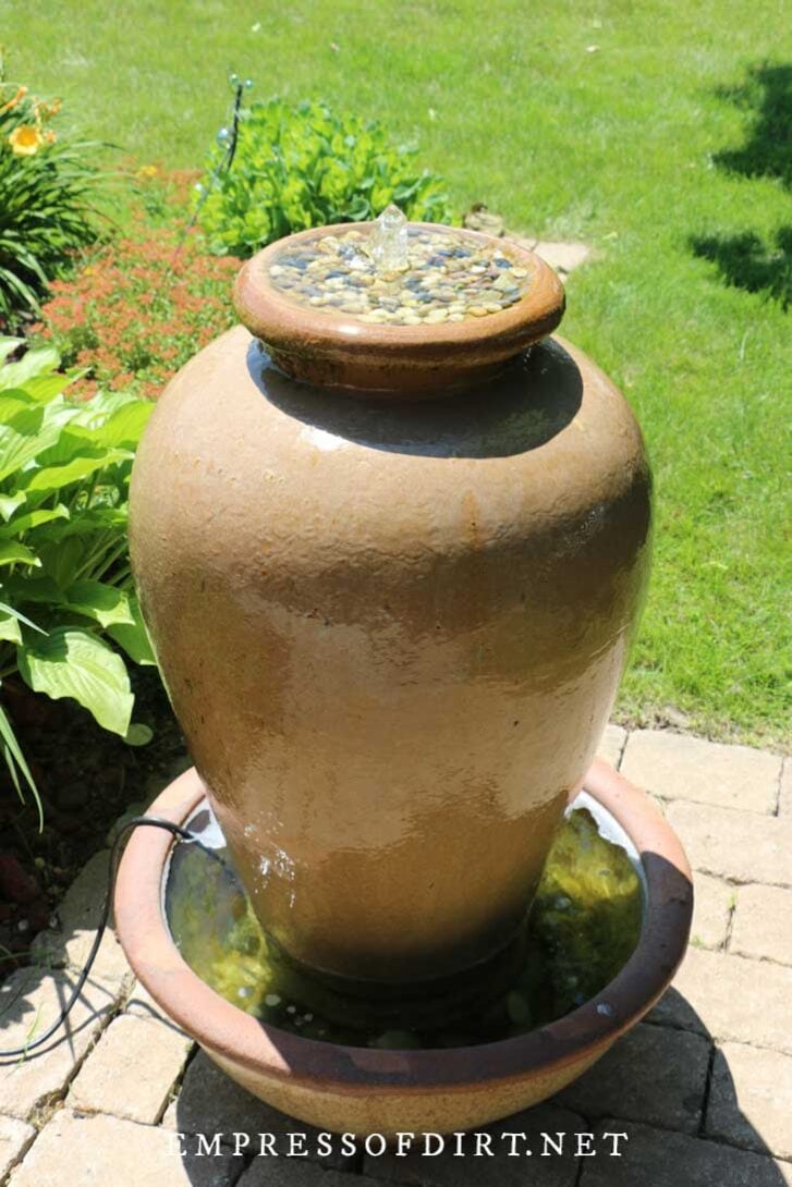 8 Charming Small Pond Ideas for Patios & Gardens